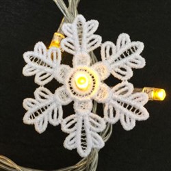 FSL Mini Snowflake Lights Embroidery Design | EmbroideryDesigns.com